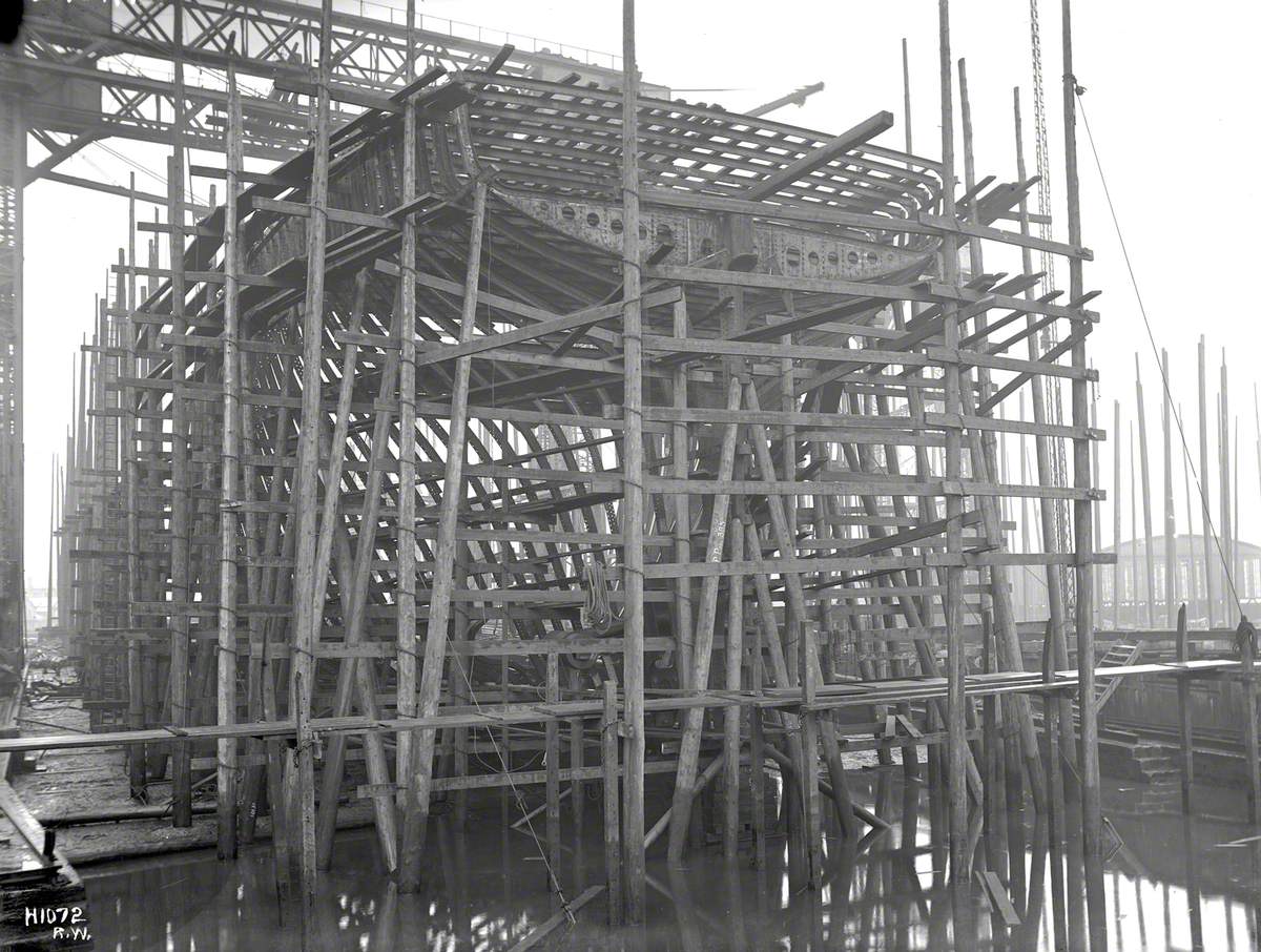 View from water side of slip showing stern frames in position | Art UK