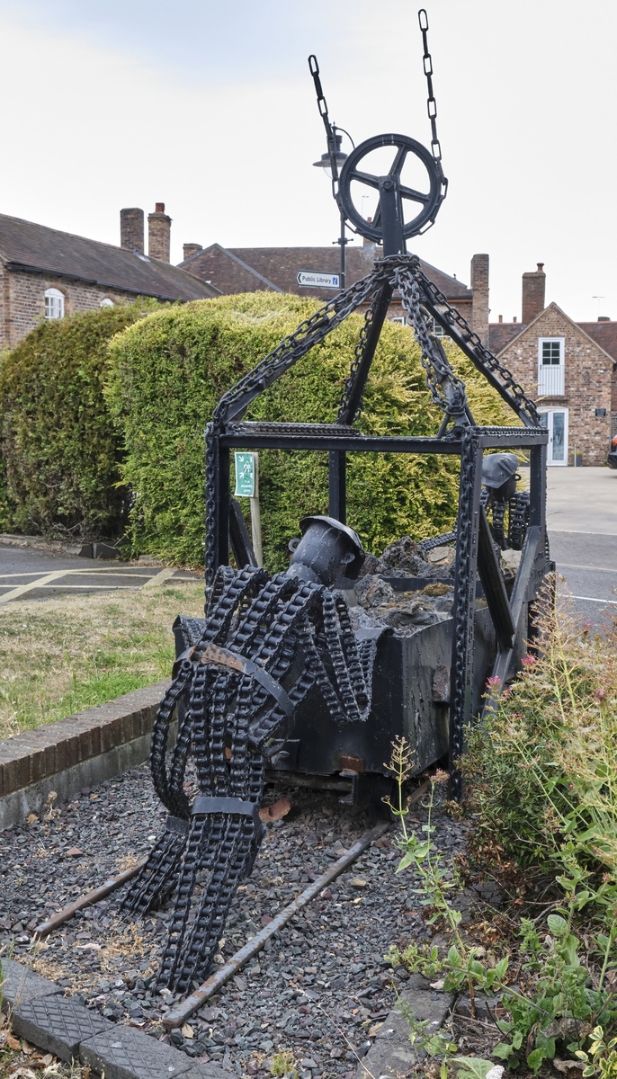 Miners Pushing Coal Tubs onto a Cage Lift | Art UK